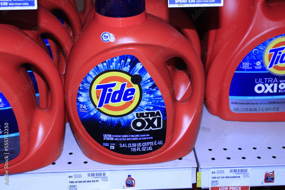 Tide Laundry soap in containers on a shelf at a supermarket Photos ...