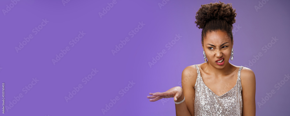 Arrogant peeky african-american woman in shiny luxurious dress cringing ... Arrogant peeky african-american woman in shiny luxurious dress cringing ...