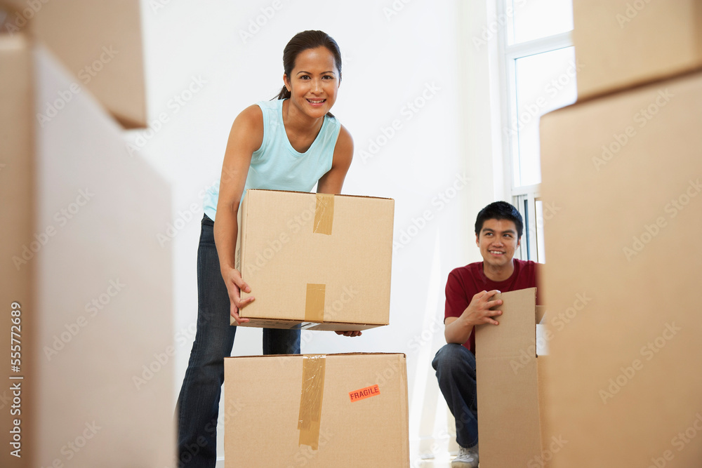 Couple Packing Boxes Stock Photo | Adobe Stock