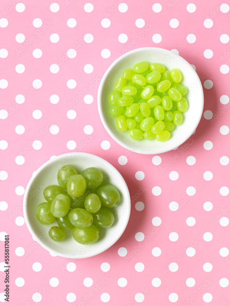 Grapes and Jelly Beans in Bowls Stock Photo | Adobe Stock