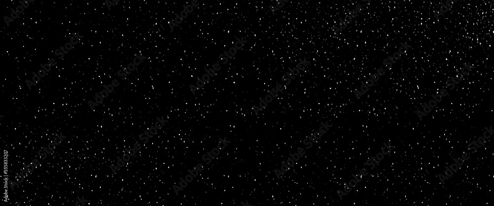 Flying dust particles on a black background, abstract real dust ...