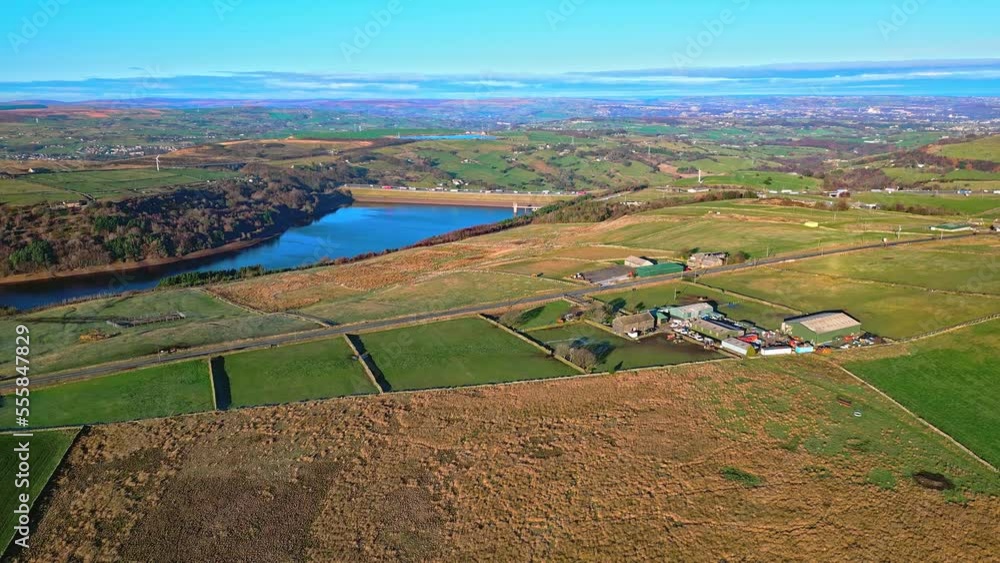 country road with the M62 motorway in the distance,crossing Scammonden ...