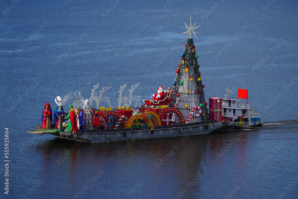 Iron Amazon ship full of Christmas decorations with figures of Nativity ...
