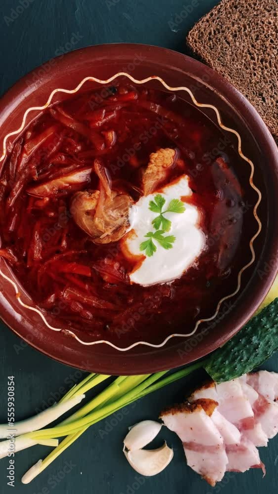 national Ukrainian dish, traditional red borscht with sour cream ...