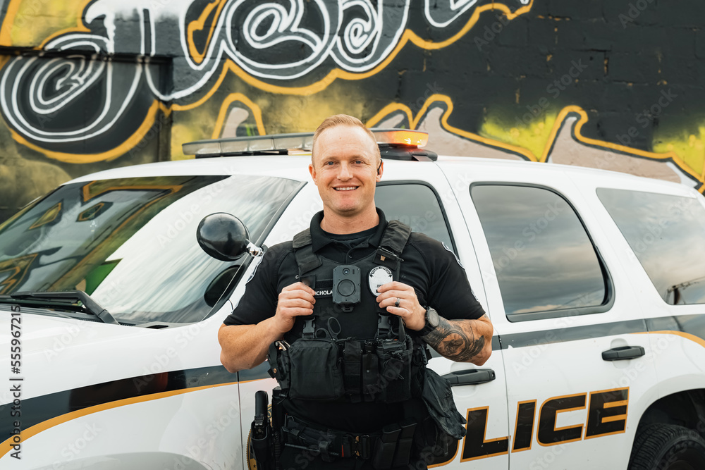 Horizontal image of white male caucasian police officer posing and ...