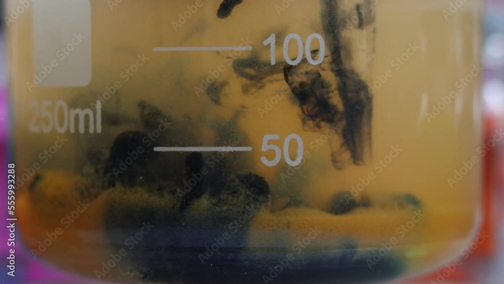 Stockvideon The formation of a black, water-insoluble precipitate of ...