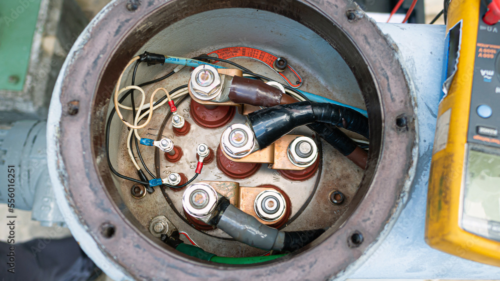The image depicts the terminals of an industrial factory's electric ...