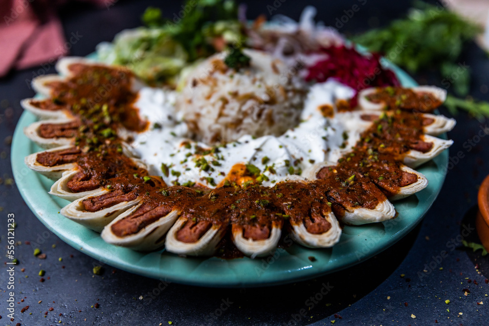 turkish beyti kebab with rice and salad Stock Photo | Adobe Stock