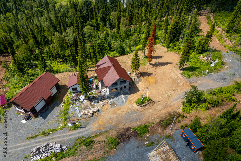 Aerial top view stages of construction houses wood build roof. New home ...
