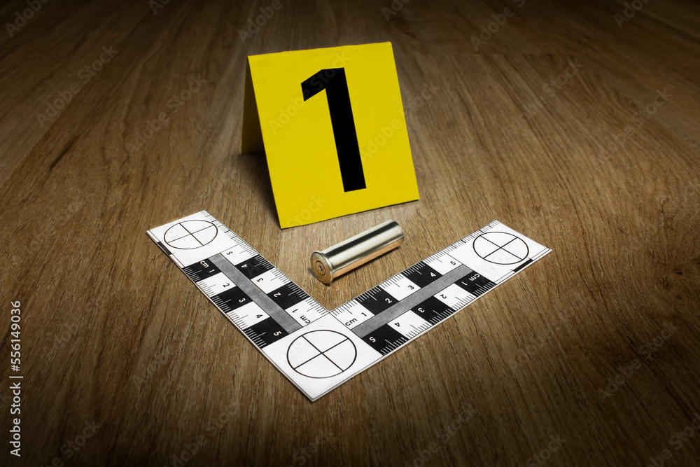Crime Scene Investigation - bullet casing as a piece of evidence placed ...