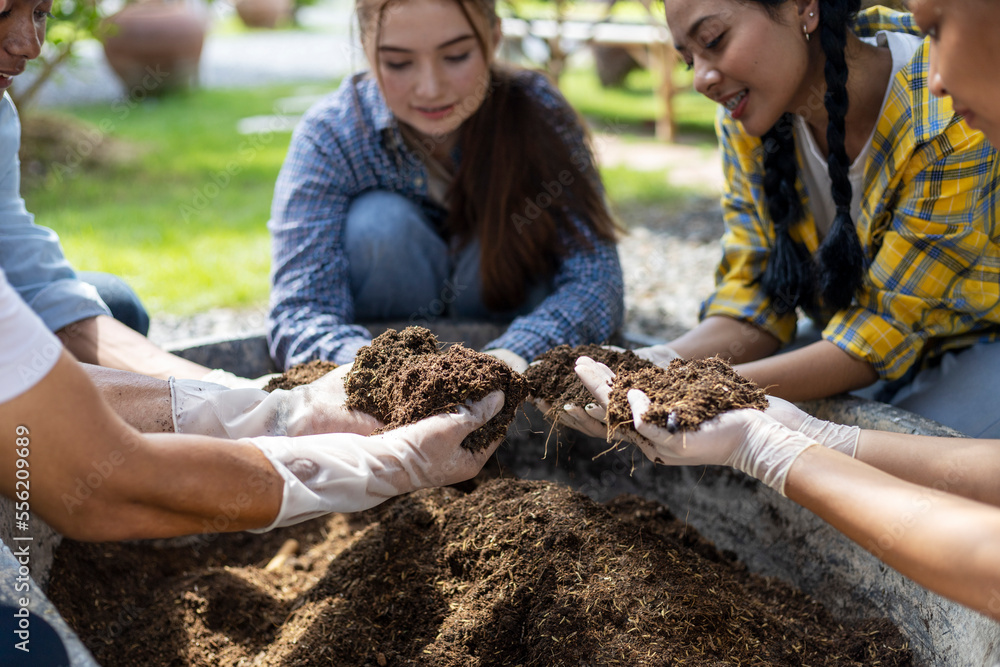 Happiness children study learning to prepare the soil before planting ...