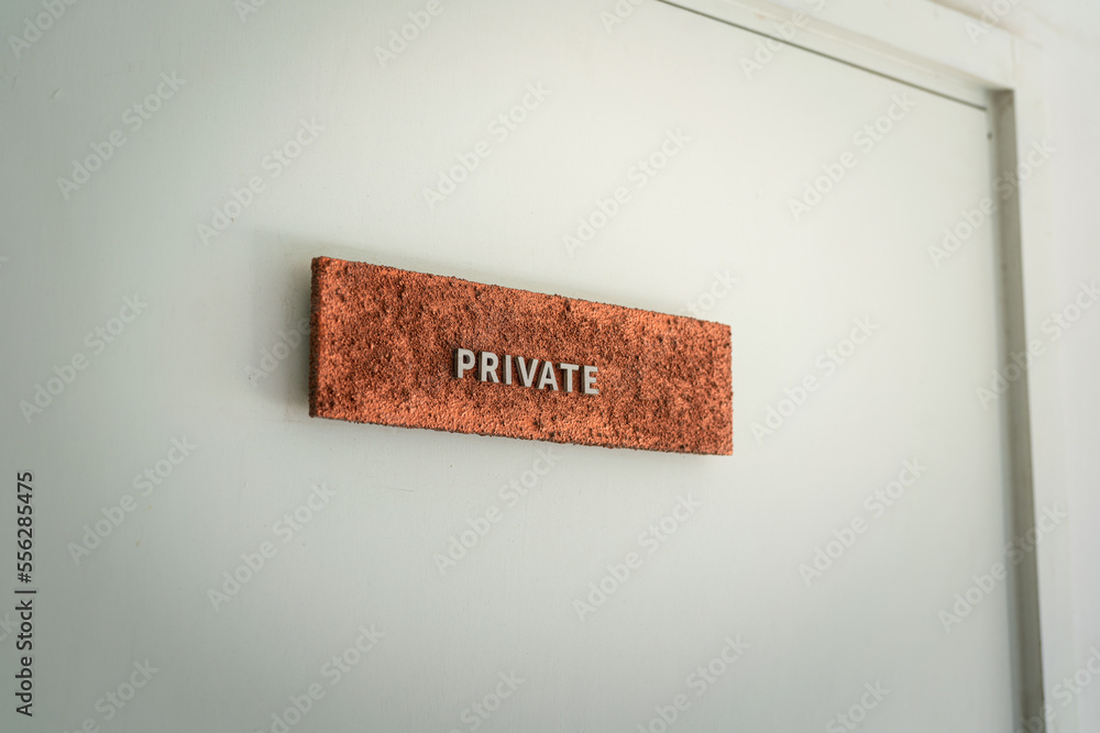 A private sign made from metallic material plate which is installed on ...