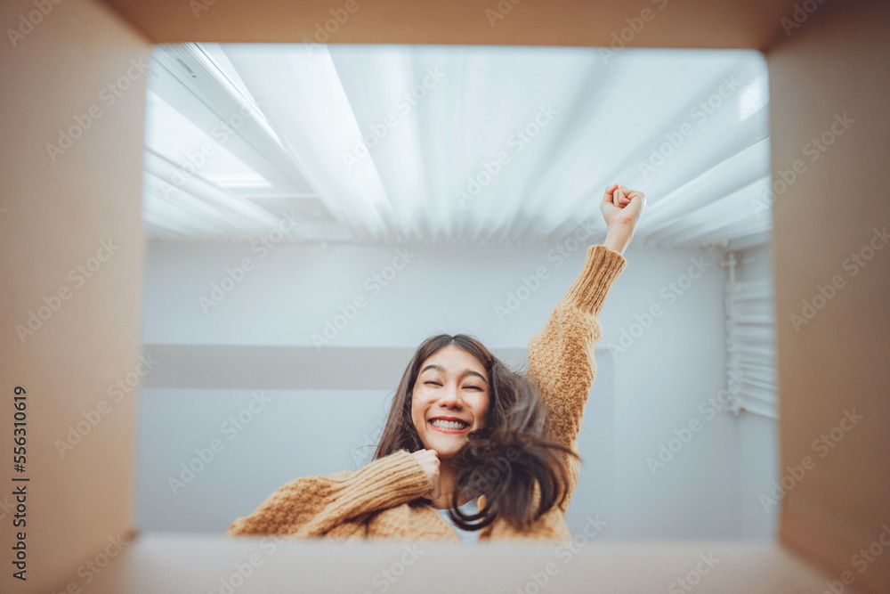 Foto de Surprise excited asian woman opening gift Christmas and new ...