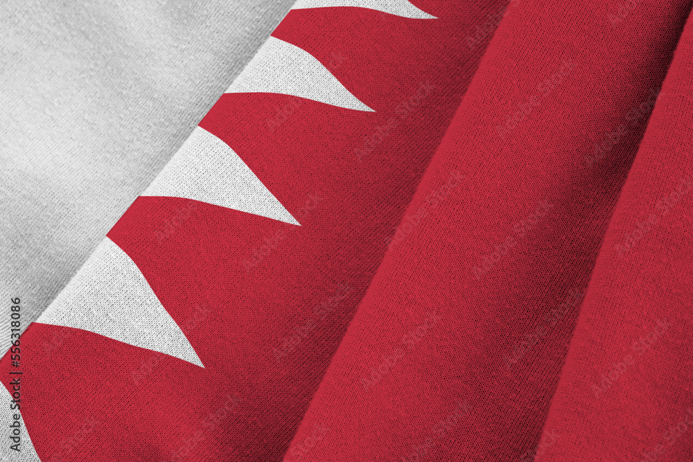 Bahrain flag with big folds waving close up under the studio light ...