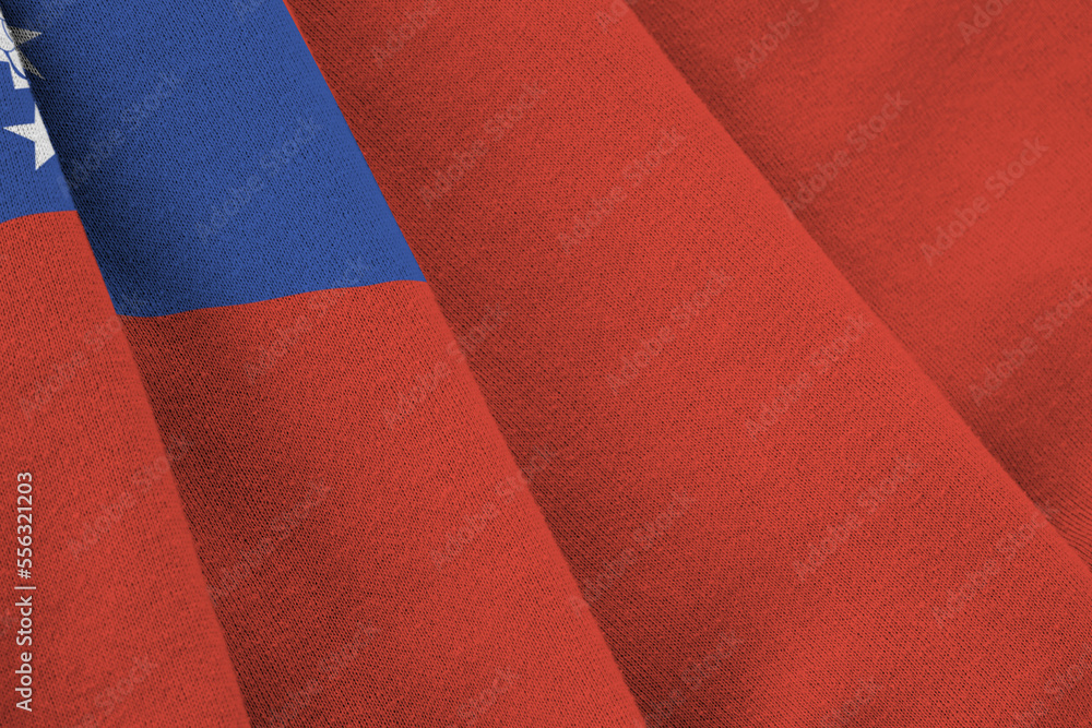 Myanmar flag with big folds waving close up under the studio light ...