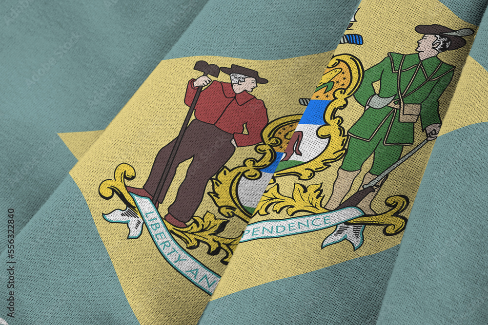 Delaware US state flag with big folds waving close up under the studio ...