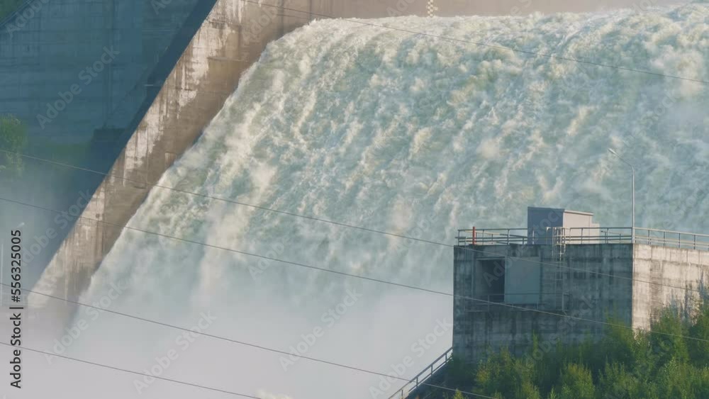 Spillway of hydroelectric power station near city. Hydropower plant ...