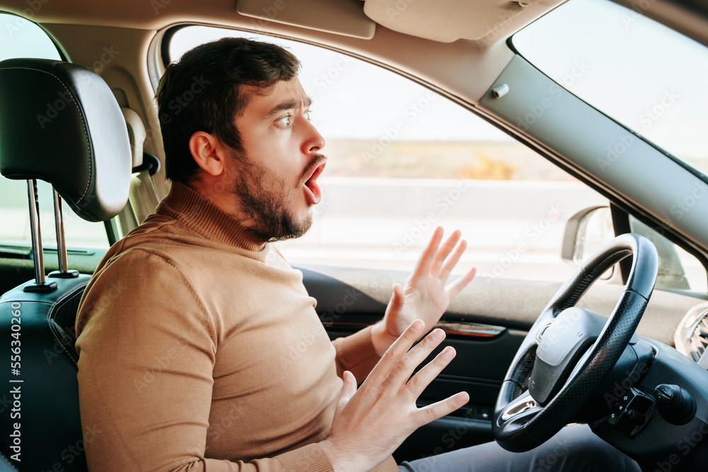 Side view scary fright depicts the guy driving the driver, he screams ...