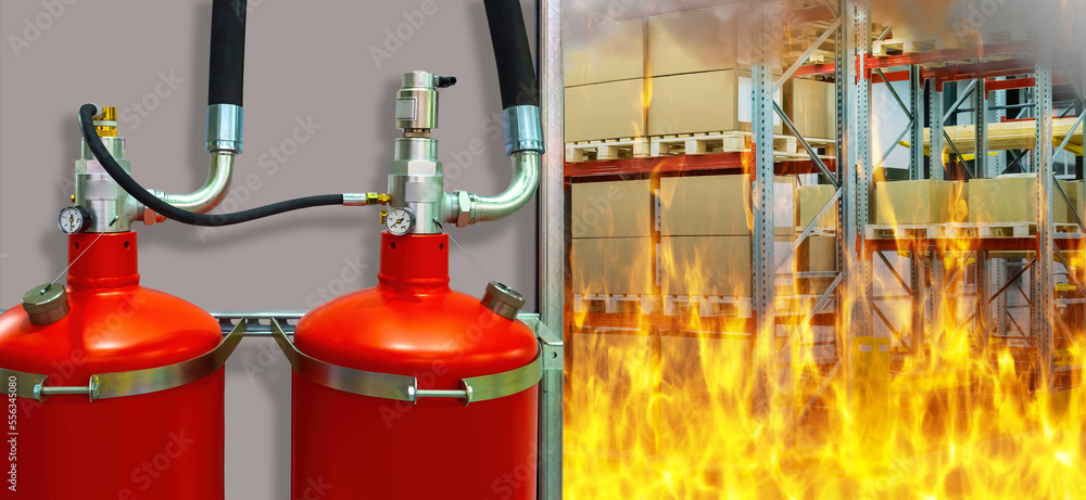 Fotografia do Stock: Fire inside warehouse. Fire extinguishers are ...