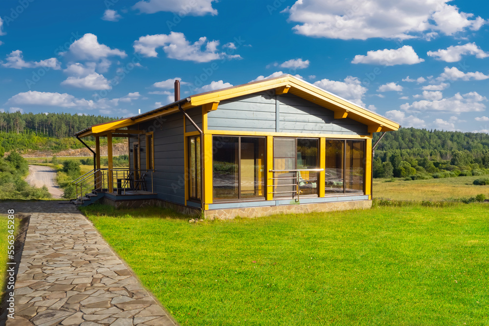 One-story country house. Cottage with panoramic windows. Village house ...