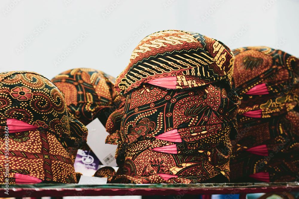 Piles of blangkon sold at a souvenir shop in Jogjakarta. The blangkon ...