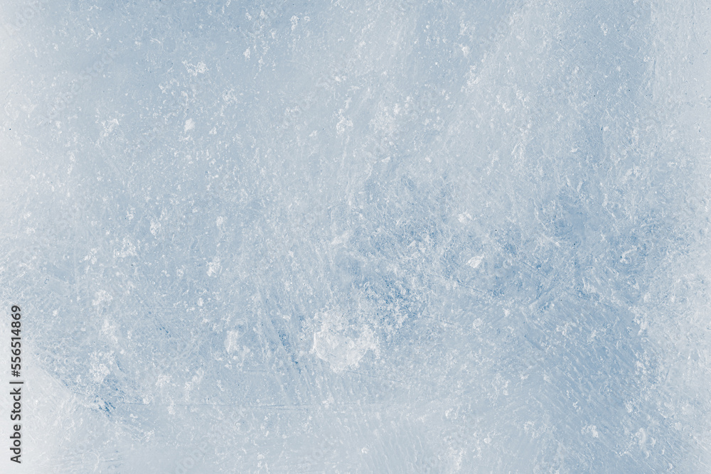 Rough ice texture, light blue tones background. The textured cold frosty surface of the ice ...