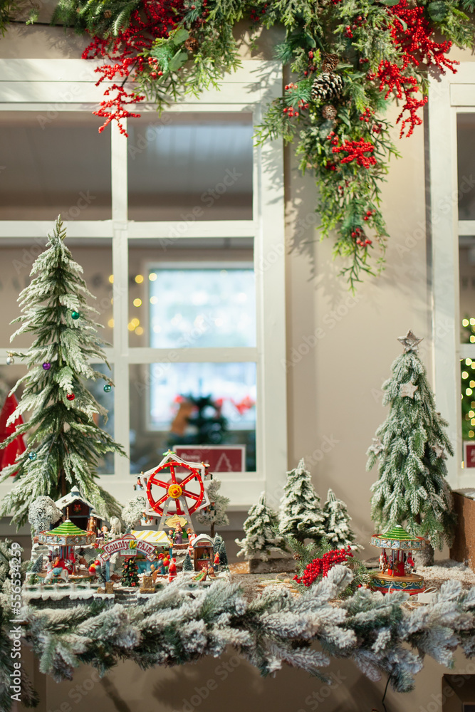 Classic red Christmas home decor with a vintage retro carousel, garland ...