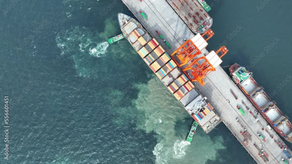 Tug boat drag pull Cargo Container Ship to international Bridge cargo ...