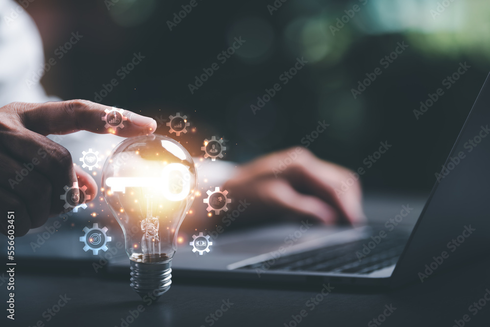 Businessman pointing light bulb, icon key to business success,solution ...