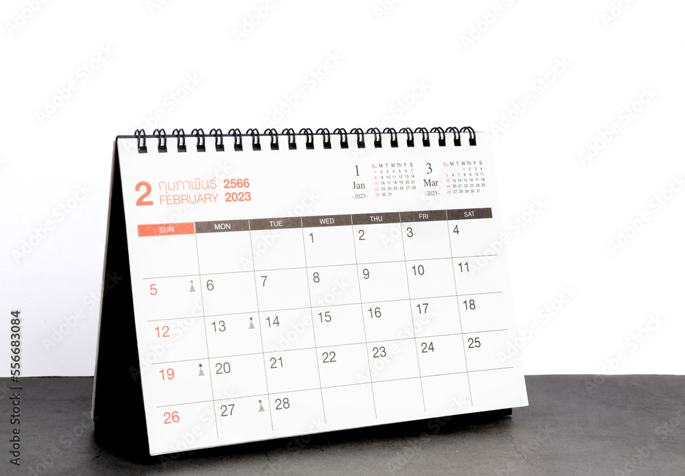 month february 2023 desk calendar for planners and reminders on a black ...