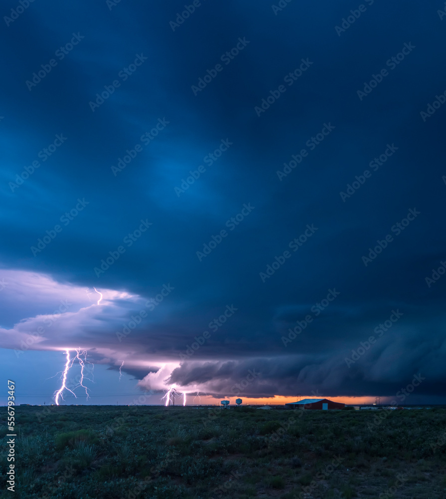 Lightning strikes from a supercell thunderstorm over the oil fields of ...