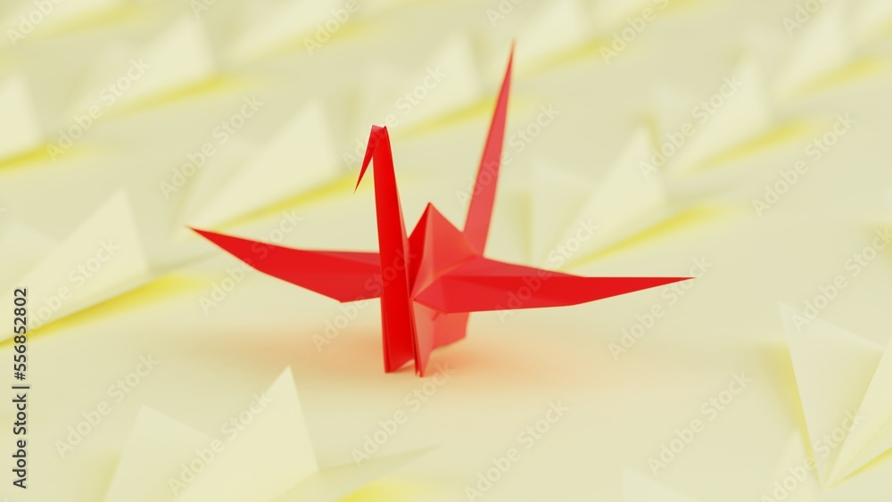 Origami of red crane and many yellow airplanes on soft blue board under ...