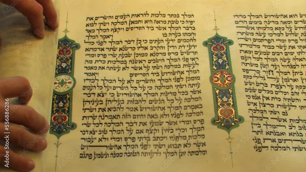 Scrolling the Book of Esther (Megillat Esther), Close up Male hands ...