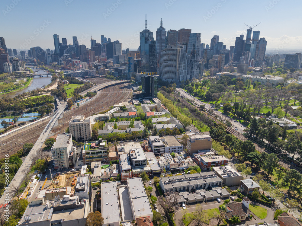 Aerial view of railway lines and high rise buildings surrounding a city ...
