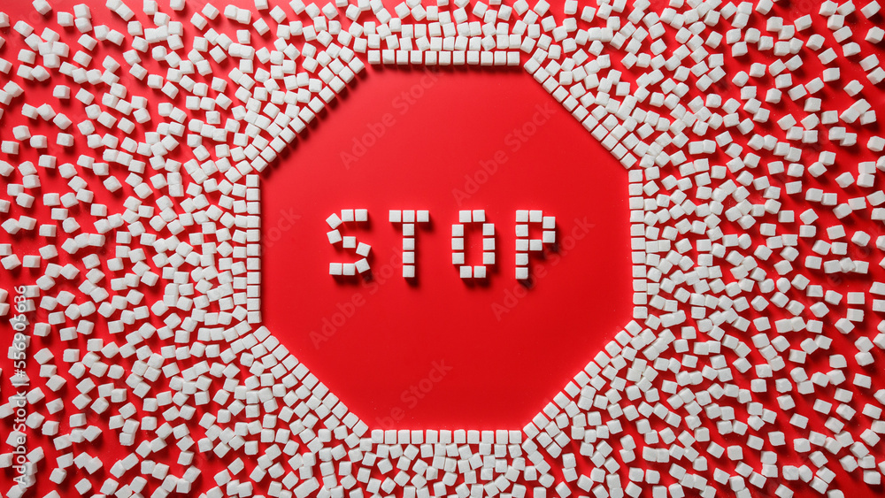 octagonal frame in the form of a stop sign made of sugar cubes with red ...