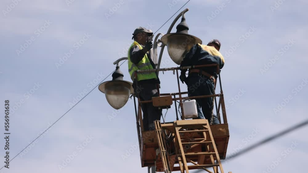 street lamp, Street light, metal pole. Street light repair works are ...