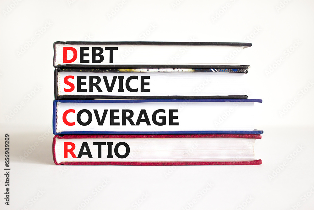 DSCR debt service coverage ratio symbol. Concept words DSCR debt ...