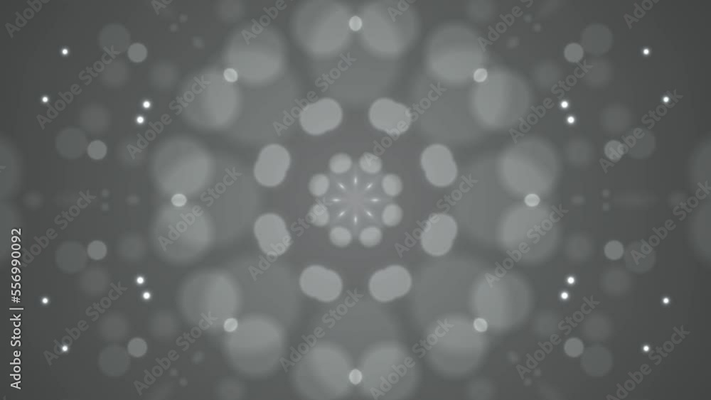 Looping wallpaper with a dark bokeh background and shimmering particles ...