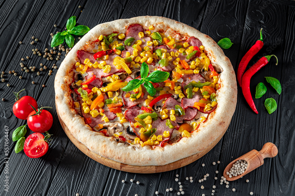 Tasty and big pizza with different types of meat. Pizza with different ...
