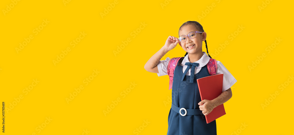 Happy Asian student child girl wears school uniform holding book, back ...