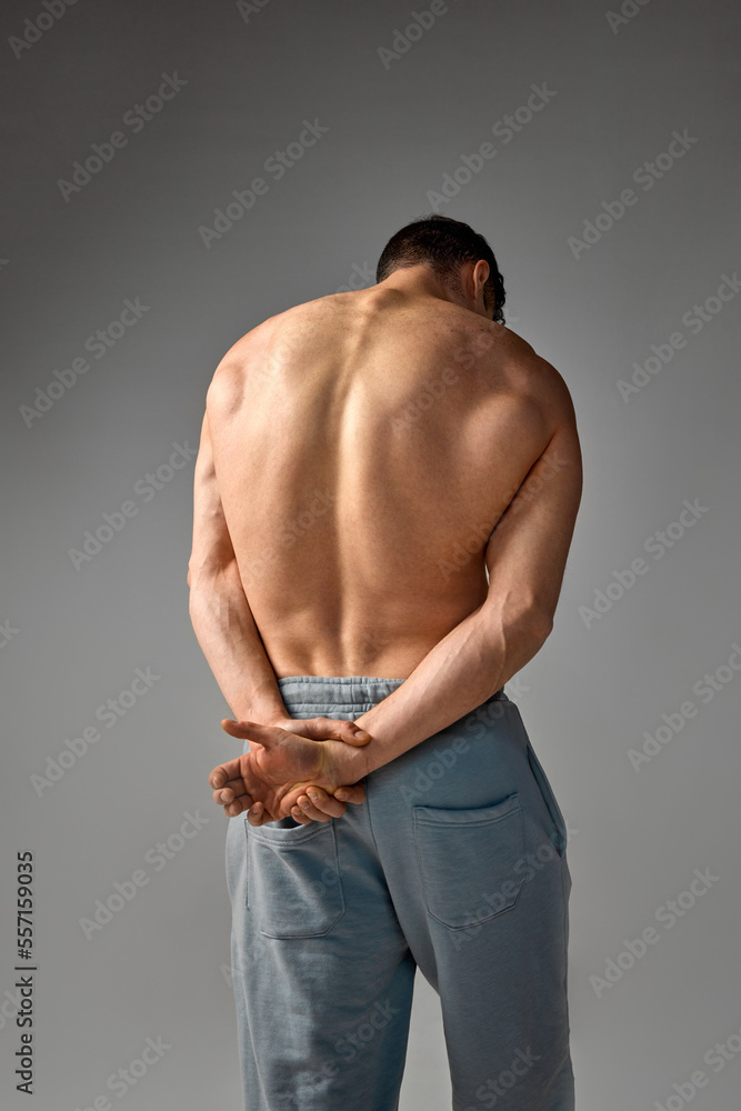 Relief, strong, muscular male back. Mature man posing shirtless in ...