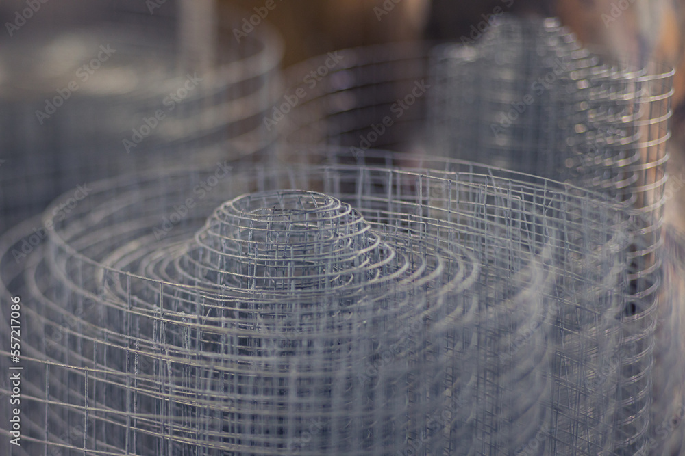 Metal mesh close-up, metal background slightly blurred. Metal grid for ...