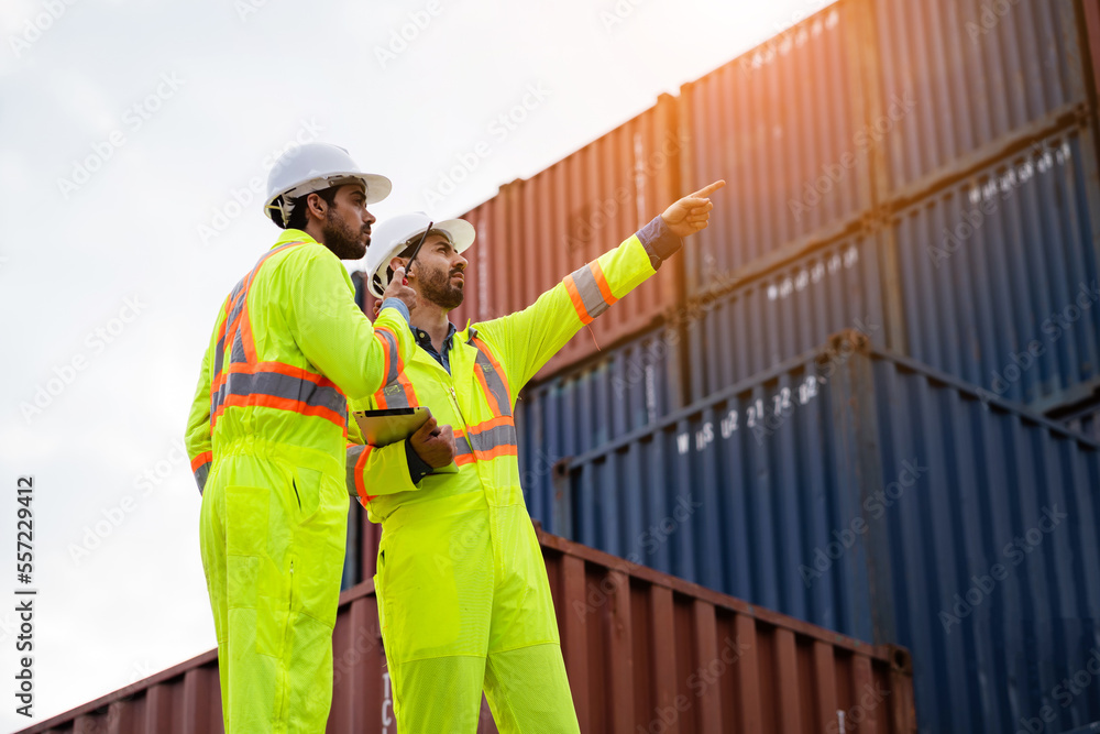 Professional foreman team Supervise the loading of containers from ...