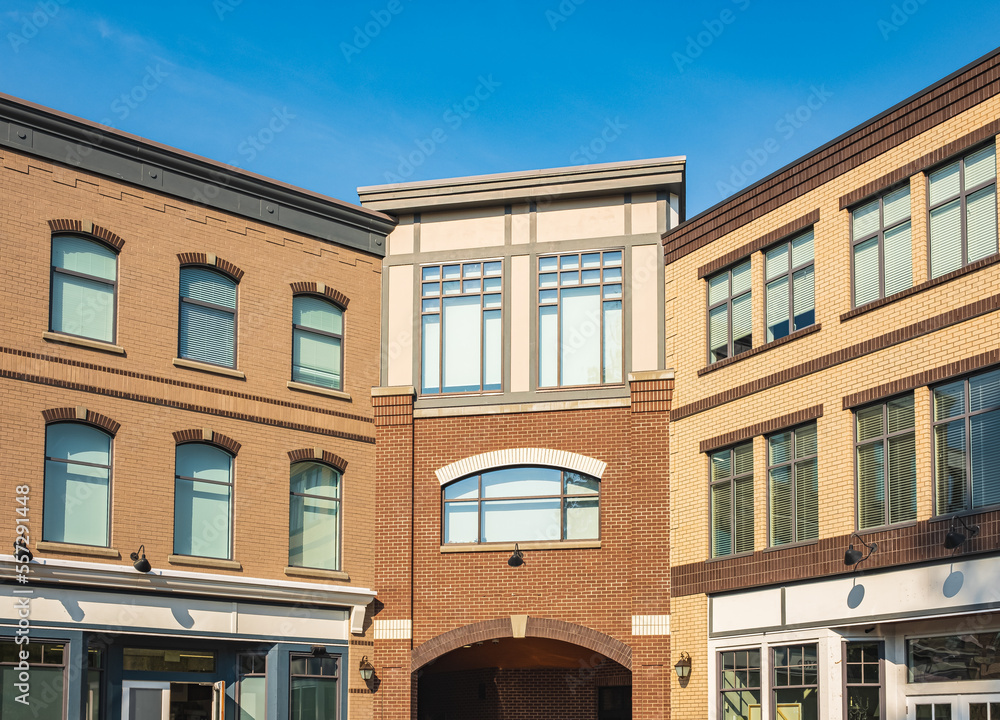 Beautiful view of building with arched windows. Windows with shutters ...