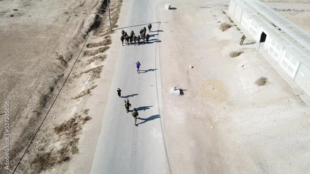 IDF Soldier running hand in hand during routine physical training on ...