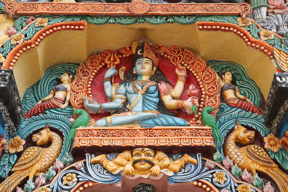 Shiva and Parvati in one body. Scenery above the entrance to a Hindu ...