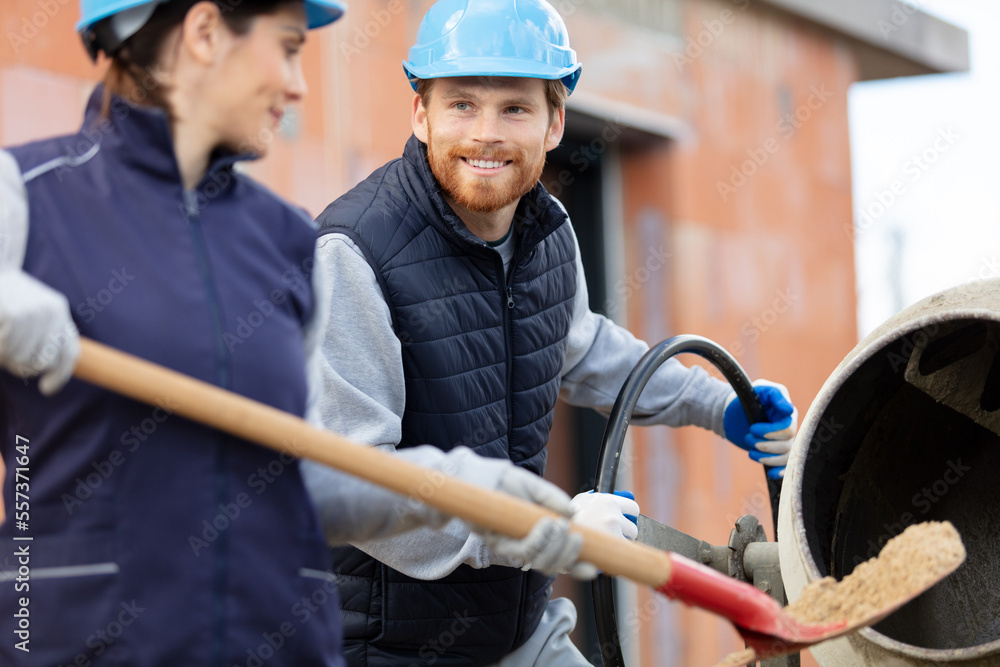 craftsman and female builder making cement Stock Photo | Adobe Stock