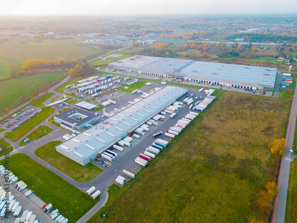Aerial view of the logistics park with warehouse, loading hub and many ...
