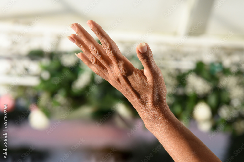 Open human hand raised to heaven worshiping the Most High. Blessing God ...