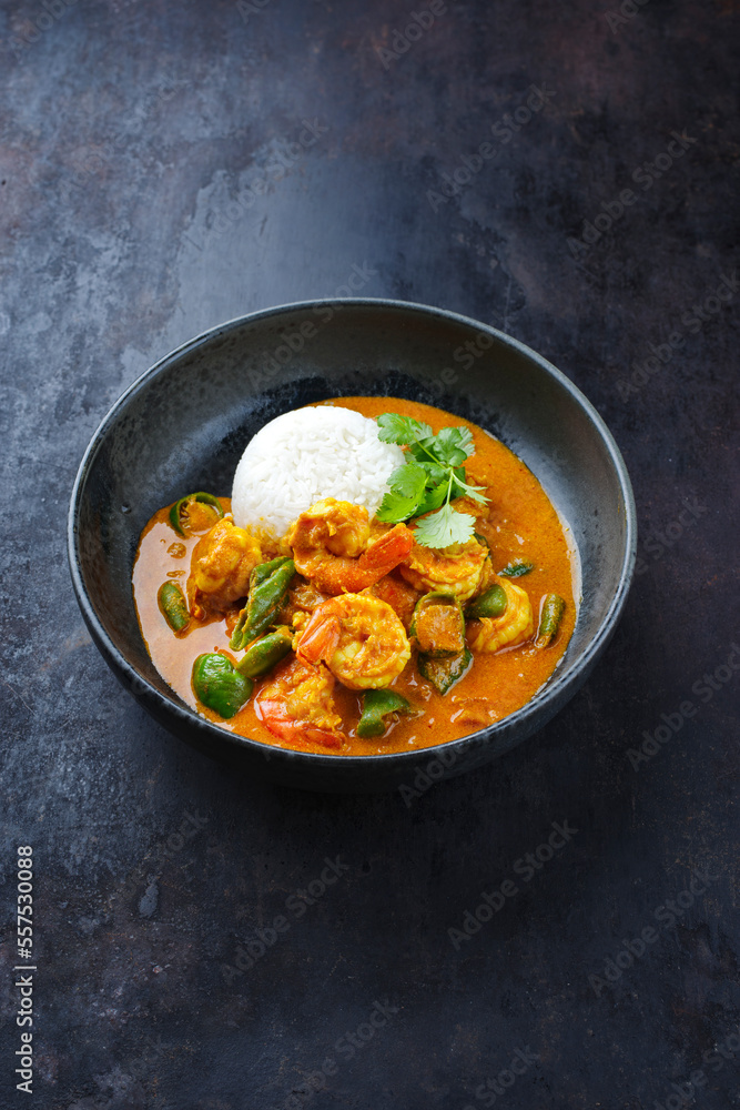 Traditional Thai kaeng phet red curry with chili and basmati rice ...